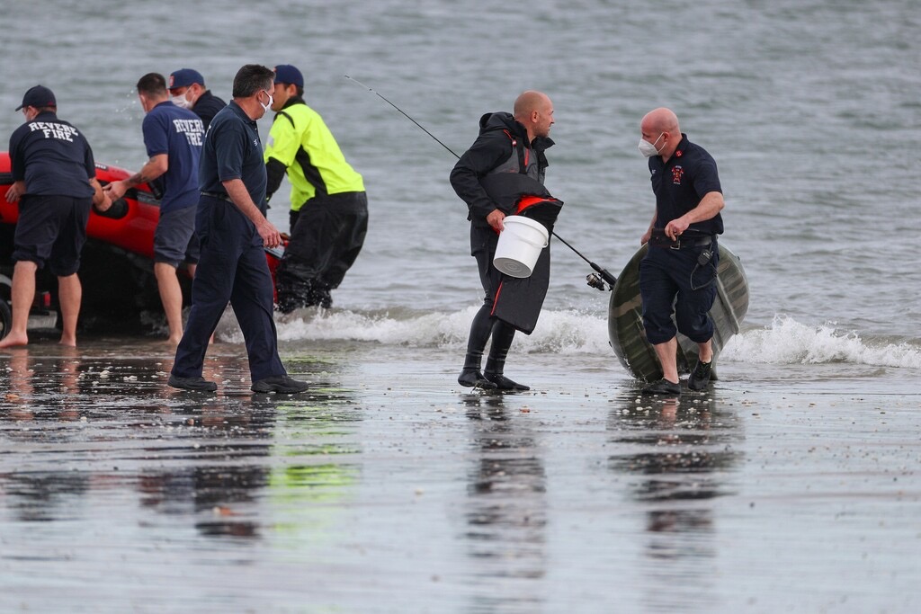 IMAGES: Fisherman Rescued After Being Blown Out to Sea – NBC Boston