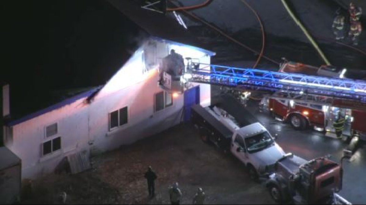Firefighter Injured Battling Blaze at Webster Auto Body Shop – NBC Boston