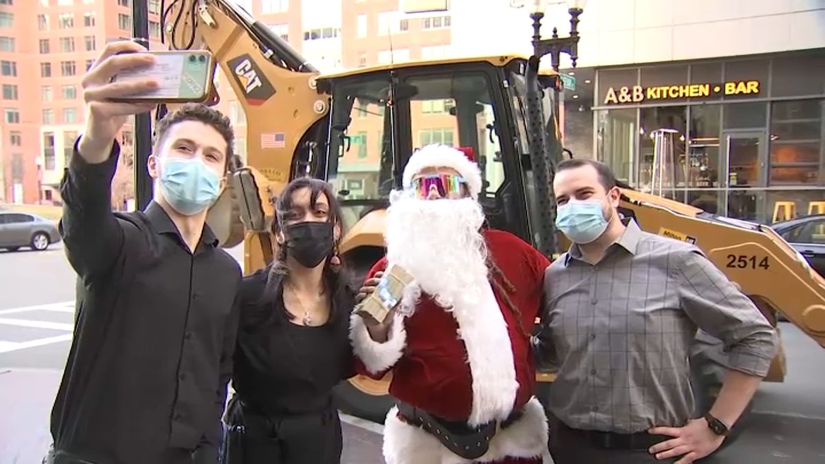 Santa Drives Backhoe, Digging Up Holiday Cheer and Charitable Donations ...