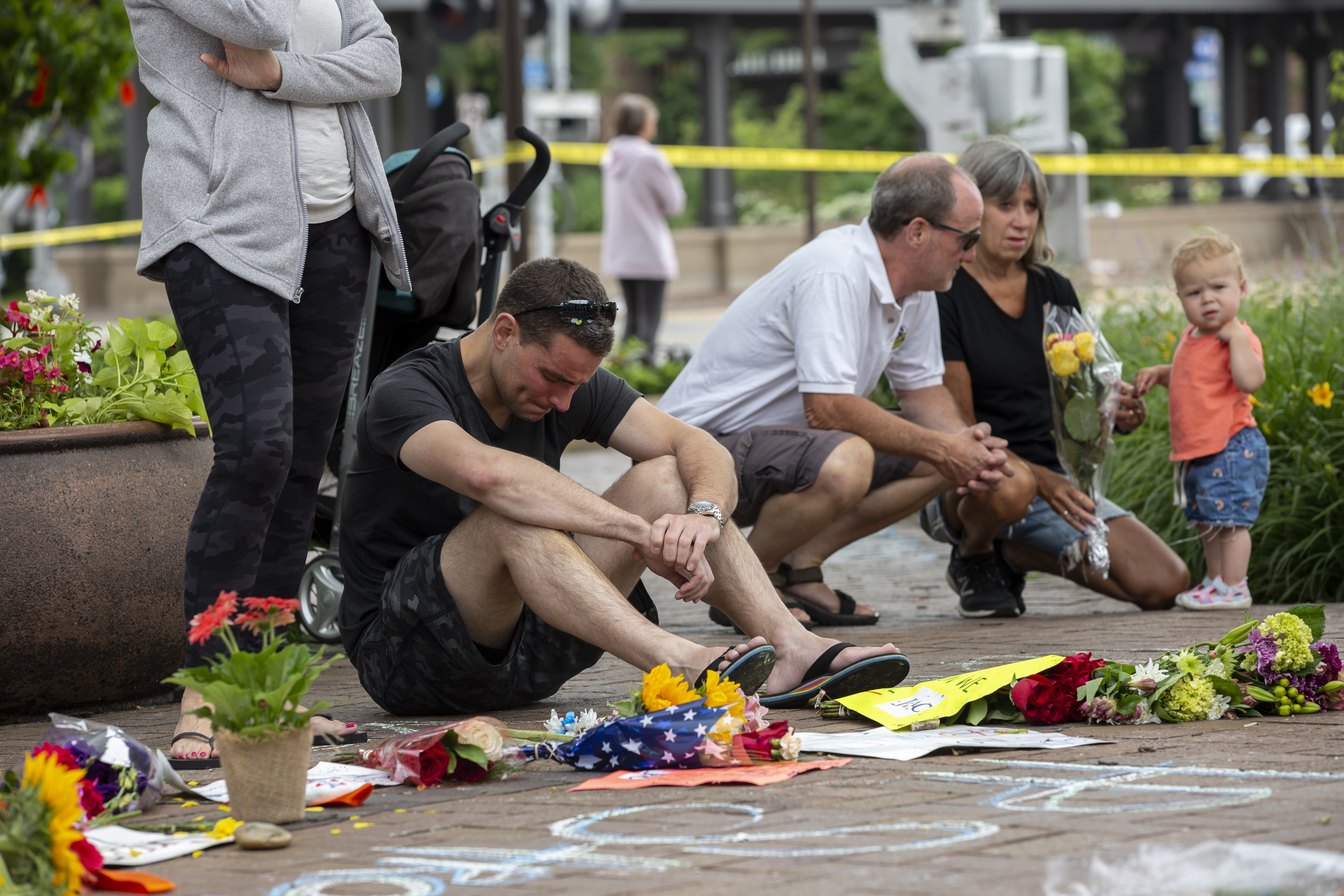 Photos: Community Remembers Parade Mass Shooting Victims in Highland ...