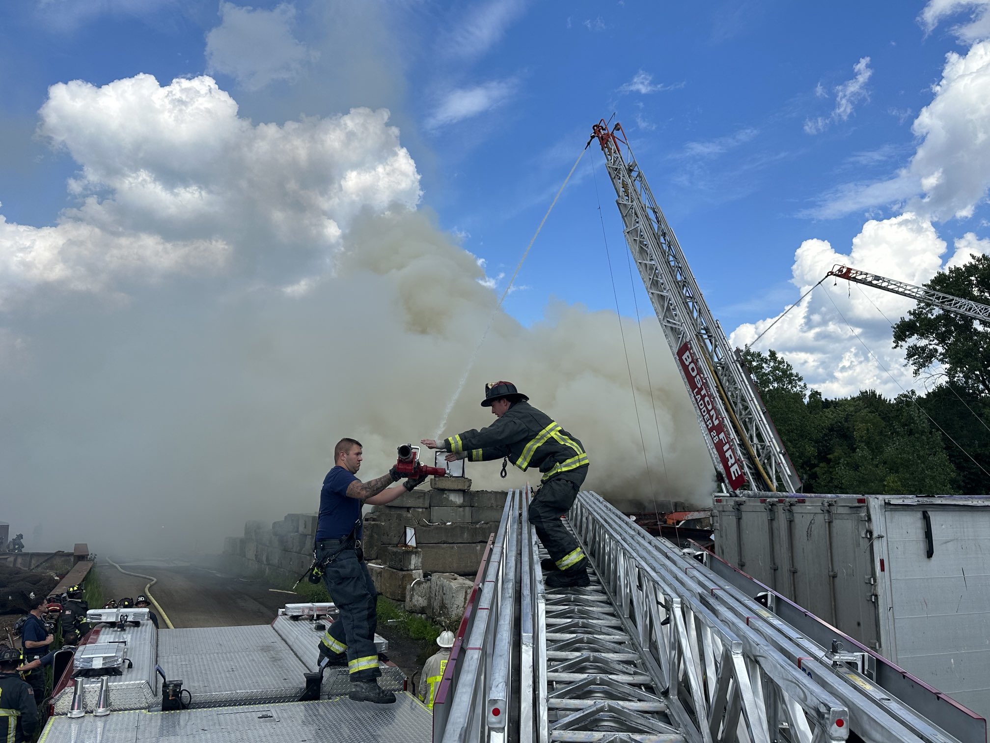 PHOTOS: Smoke over Hyde Park scrapyard fire, Boston firefighters say ...