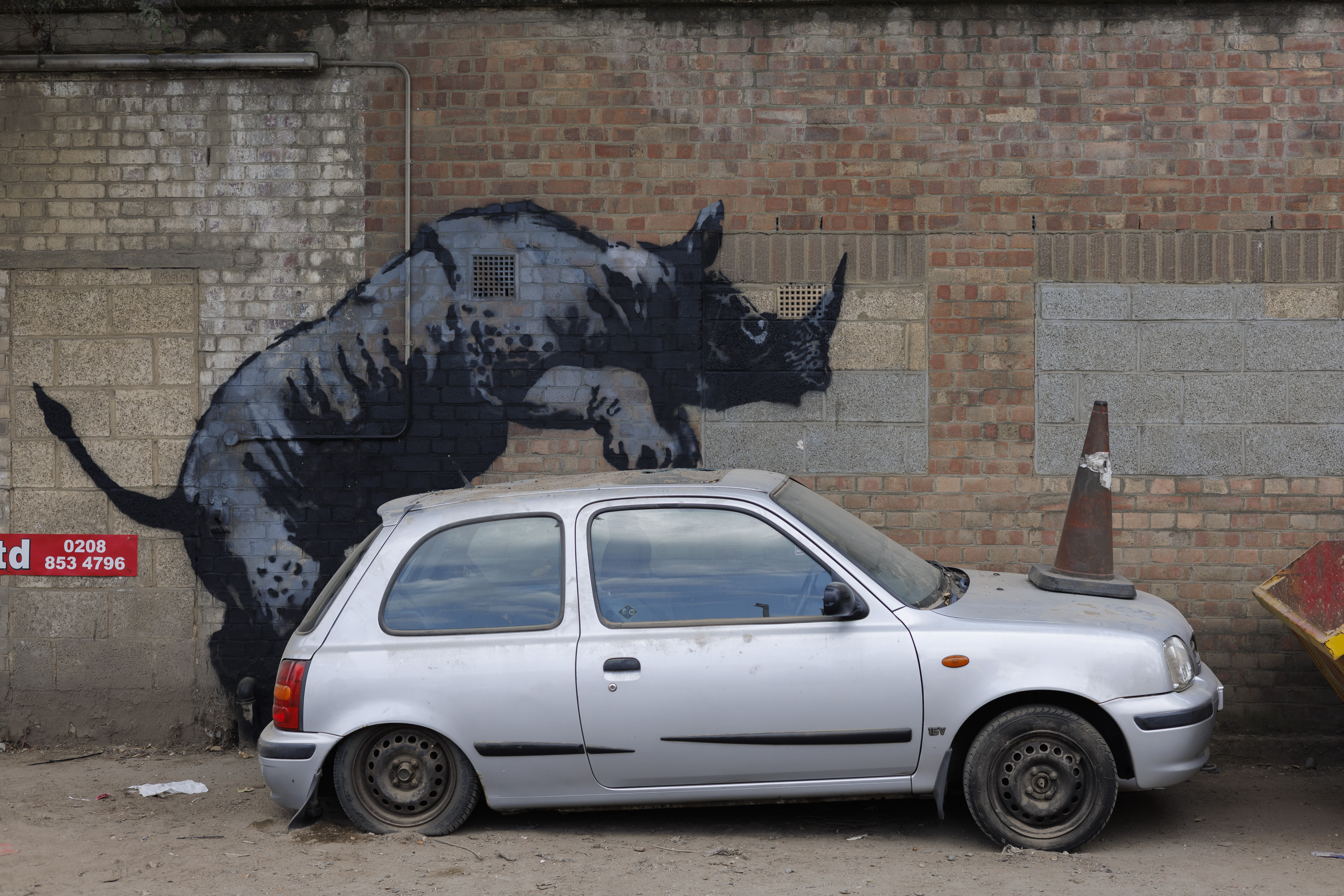 Banksy unveils new rhino art in animal-themed collection across London ...