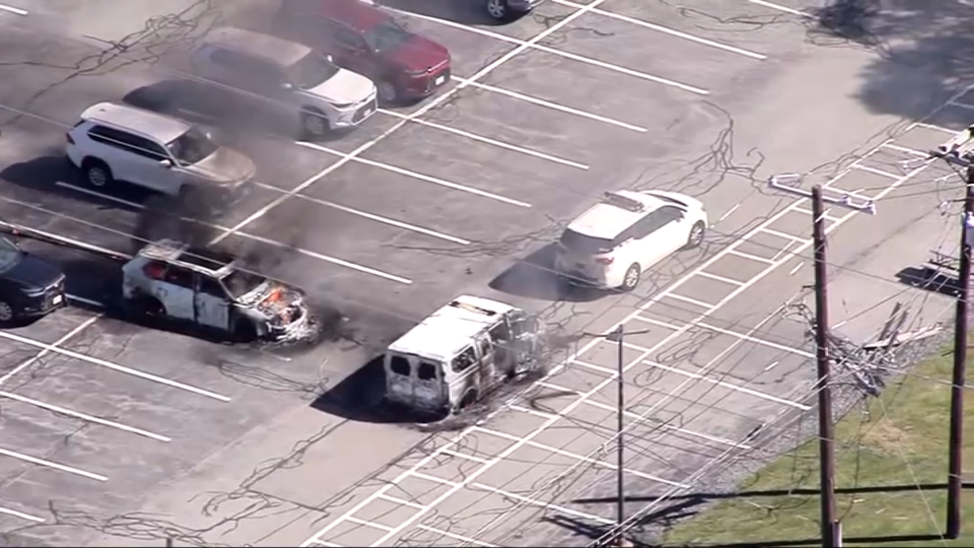 Waltham, MA parking lot power line car fire — video, photos – NBC Boston
